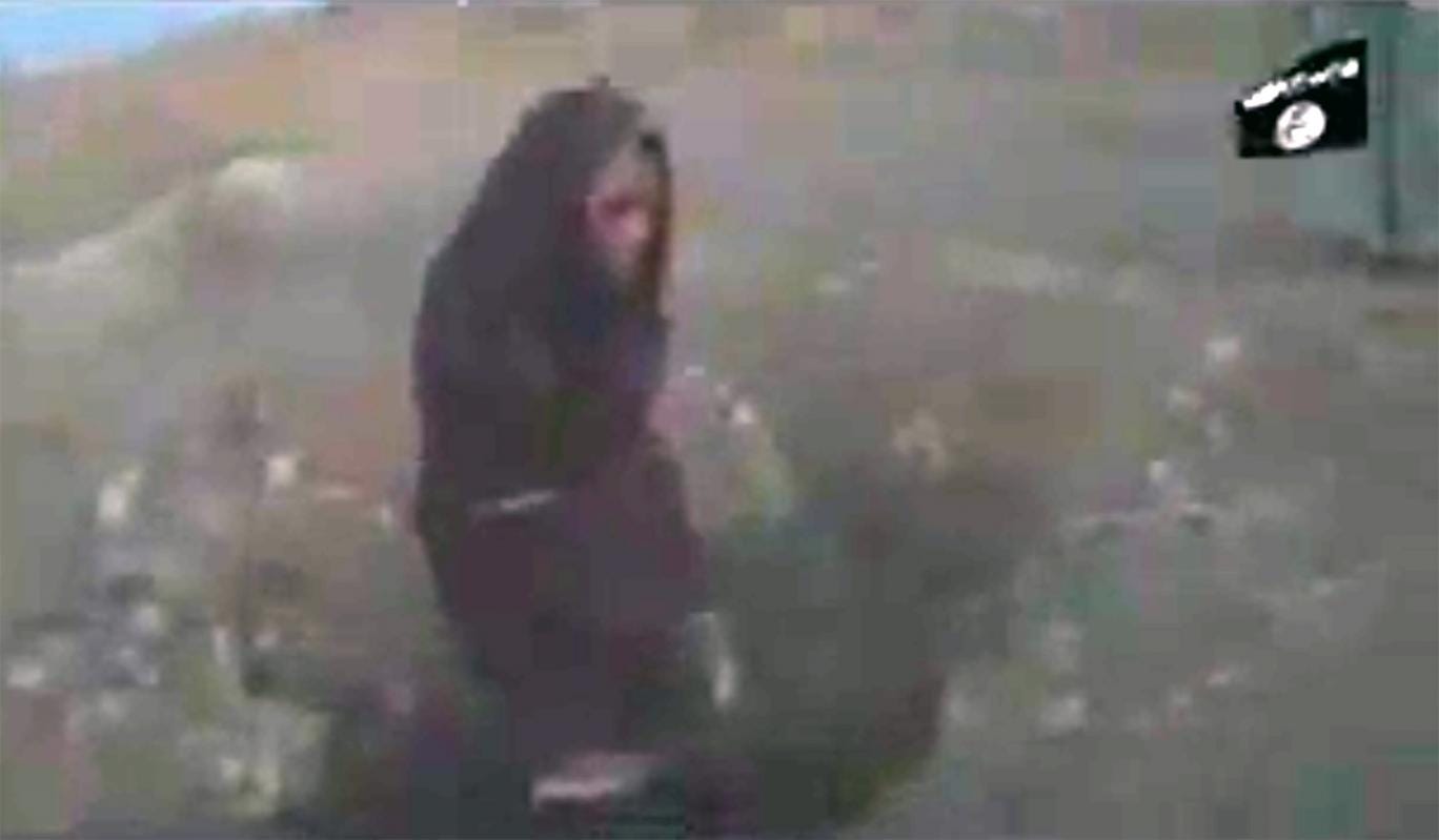 Isis releases first video showing the stoning of woman accused of committing adultery as her ...