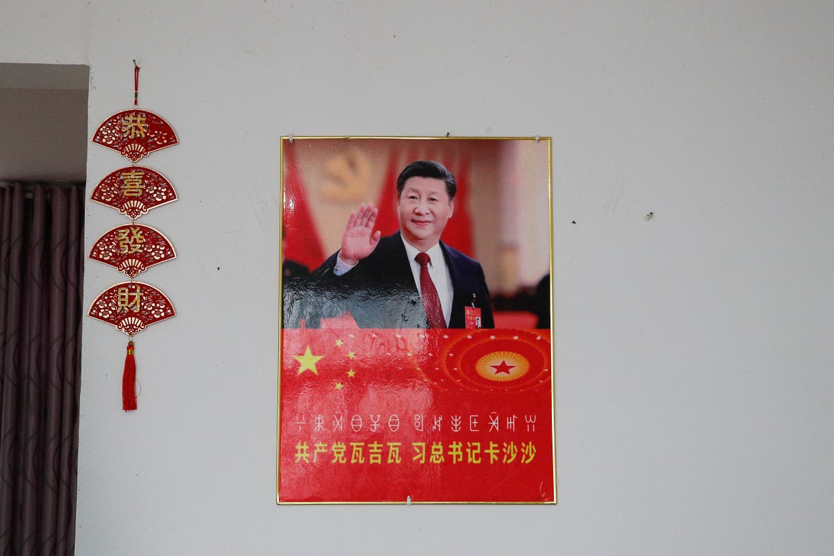 AP PHOTOS: Xi's portrait adorns new homes for China's poor China ...