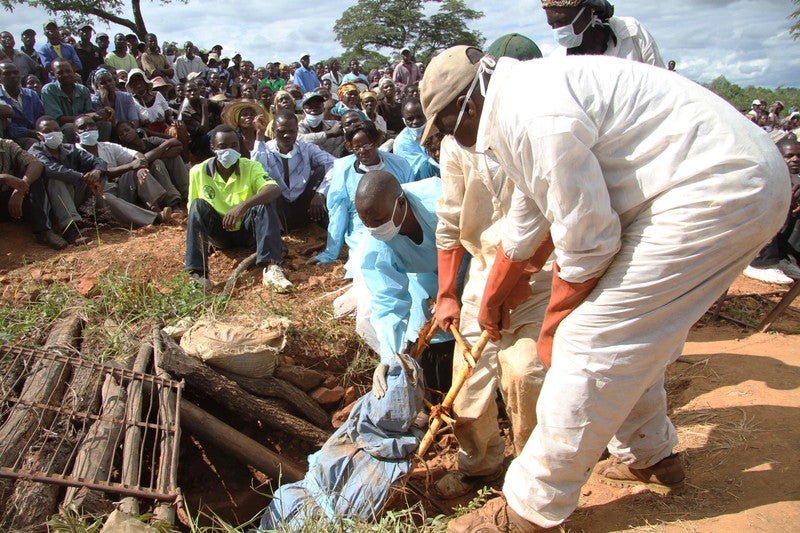 One archaeologist’s hunt for the secret mass graves of Zimbabwe | The ...