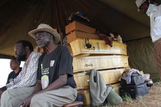 One archaeologist’s hunt for the secret mass graves of Zimbabwe | The ...