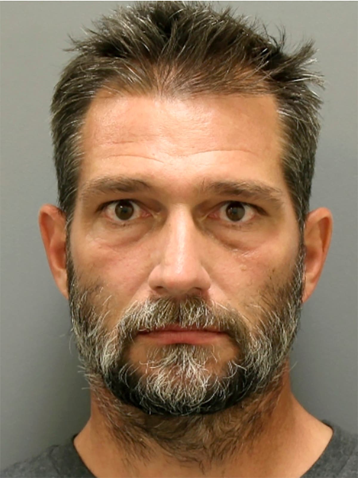 Texas man accused of punch amid Trump argument turns self in | The ...