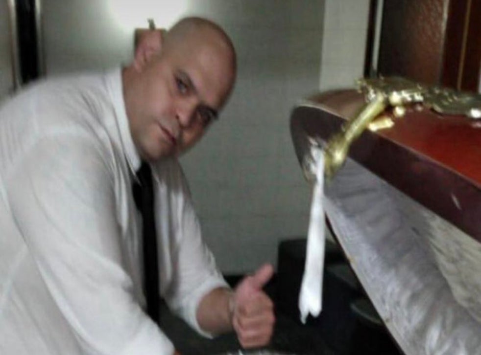 Funeral workers pose for grinning pictures with Diego Maradona’s body ...