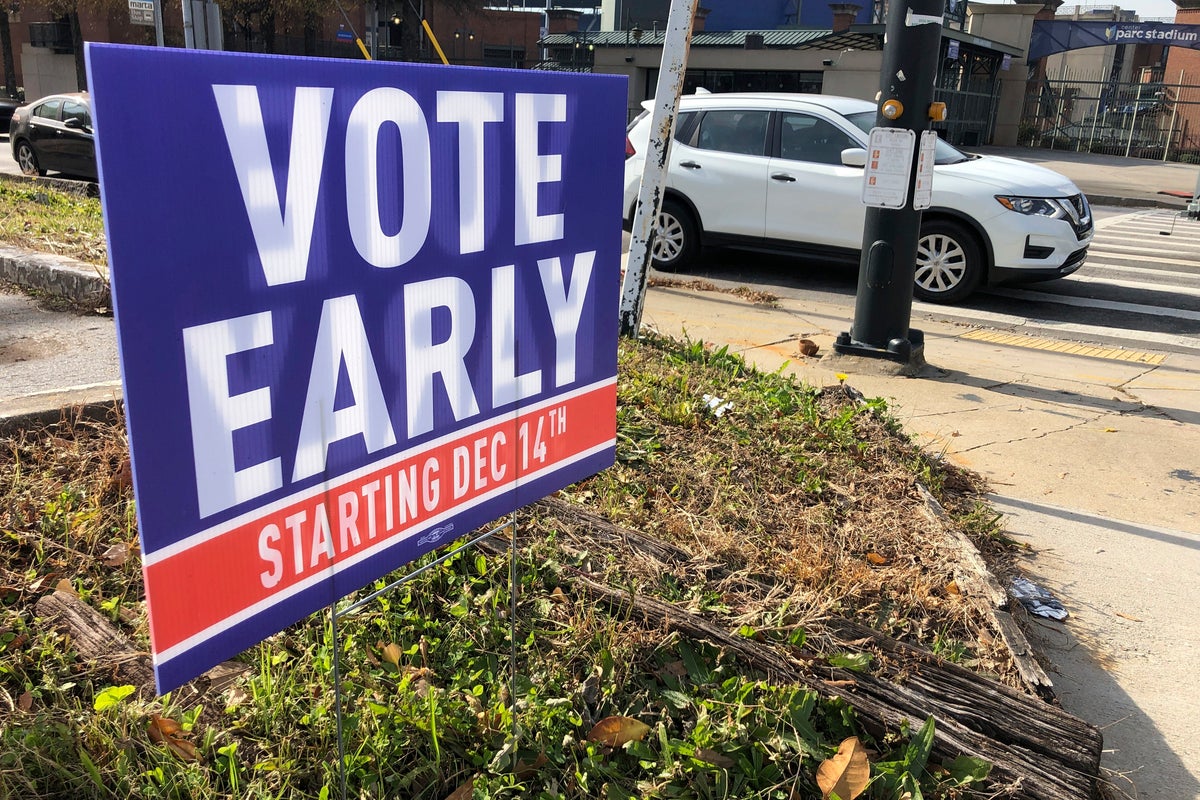 Early in-person voting begins in Georgia Senate runoffs voting Raphael ...