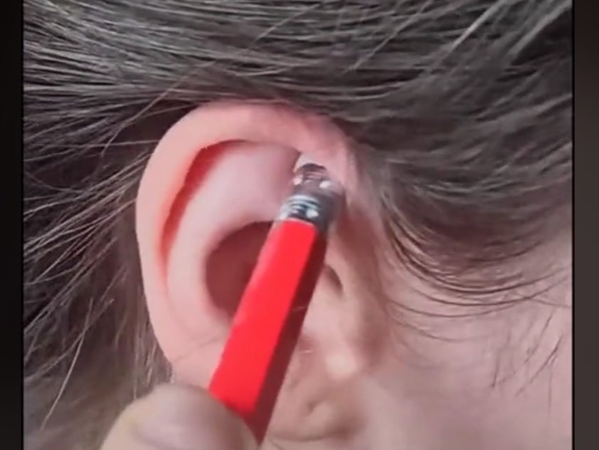 Woman shares pencil hack for preventing period pain | indy100