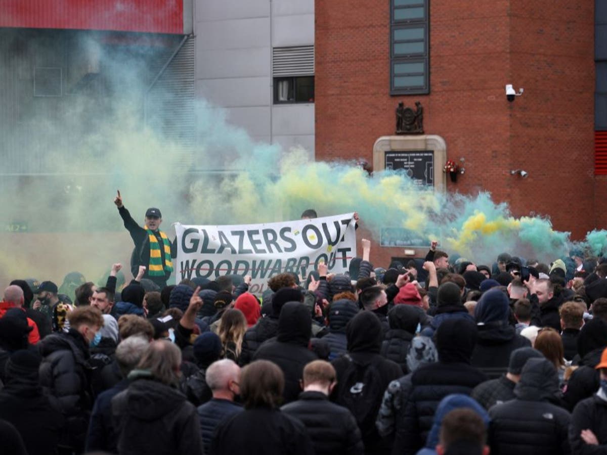 Two people arrested as Manchester United fans protest against owners ...