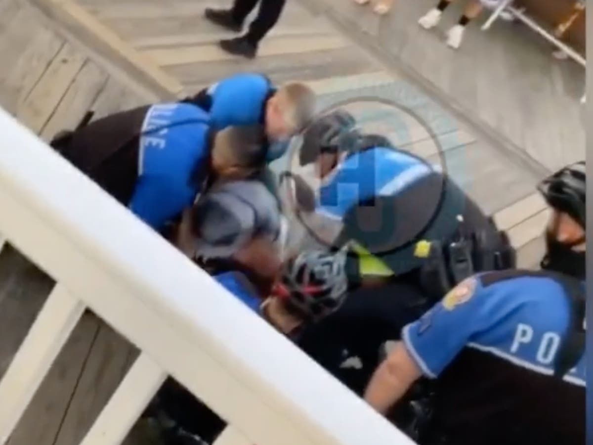 Police officers videoed Tasing and kneeling on Black teenagers for ...