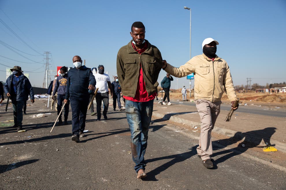 Vigilantes take to South Africa’s streets as death toll from looting ...