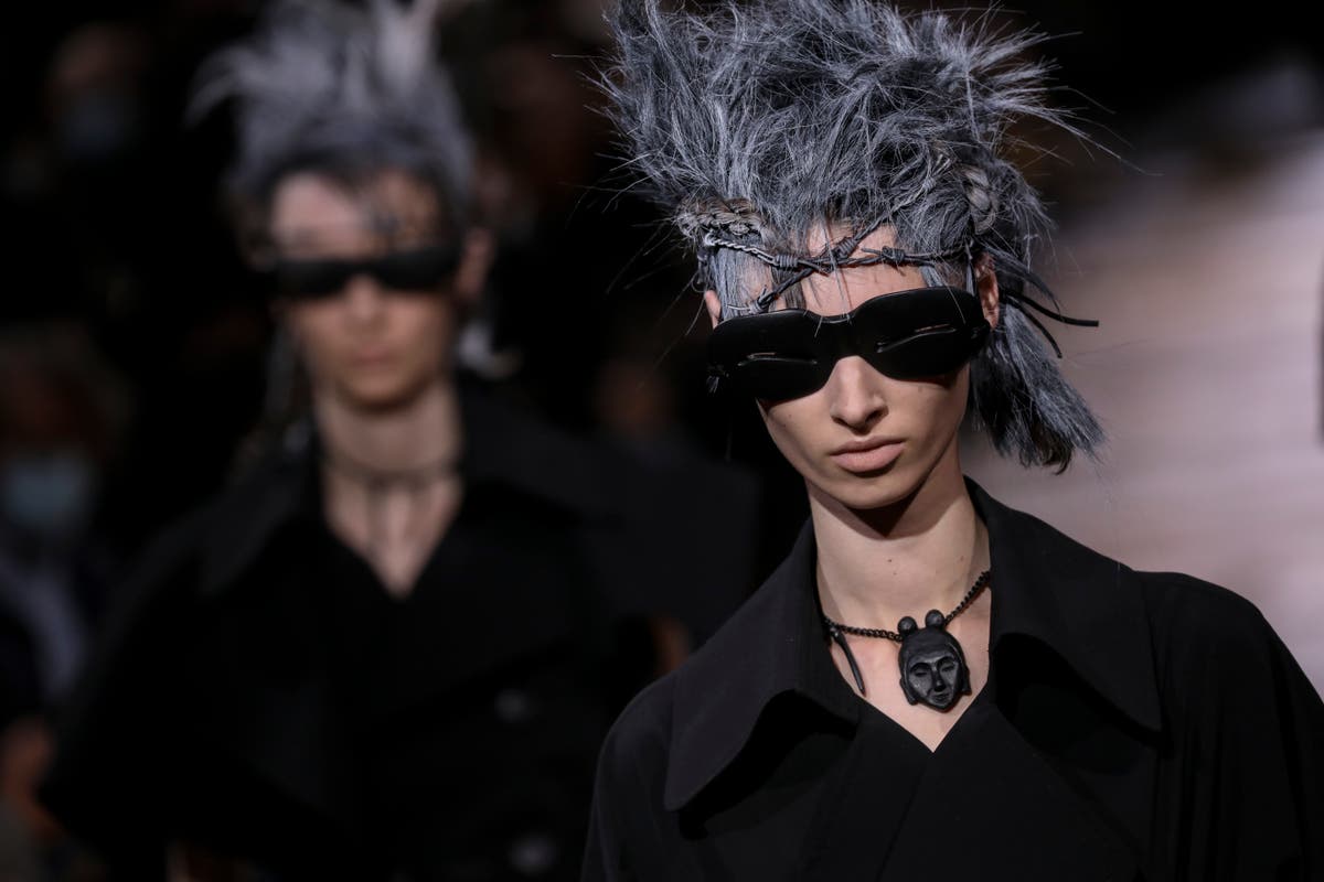 AP PHOTOS: Parish Fashion Week returns after virus hiatus | The Independent