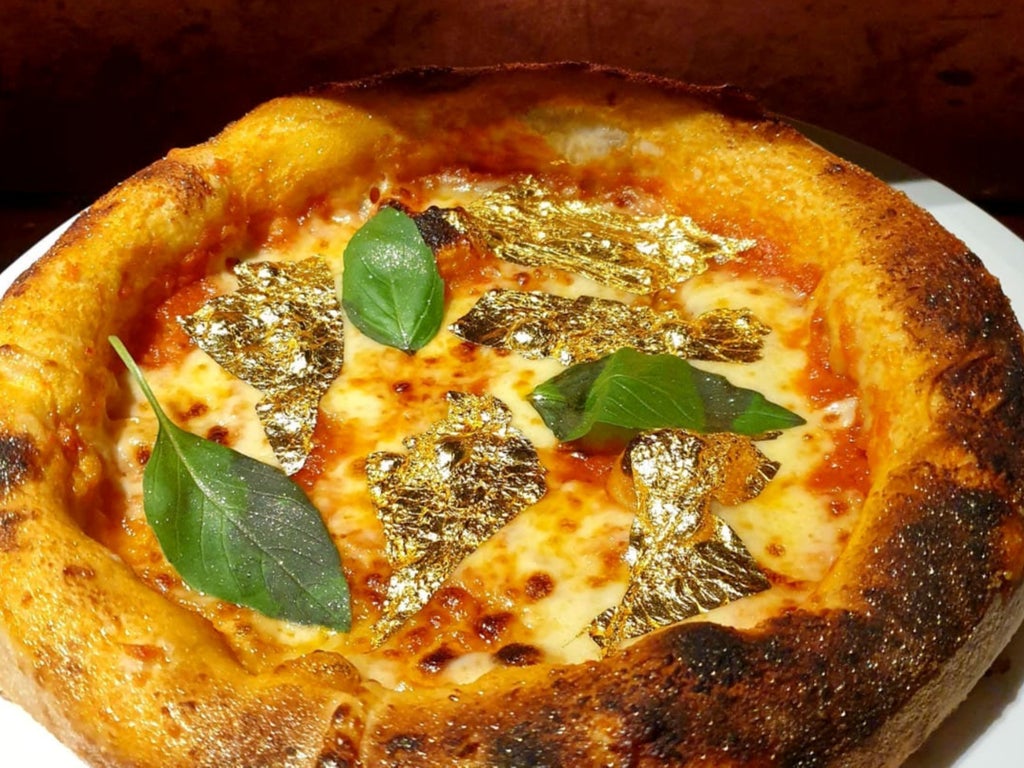 Pizzeria inspired by Salt Bae to create pizza with…