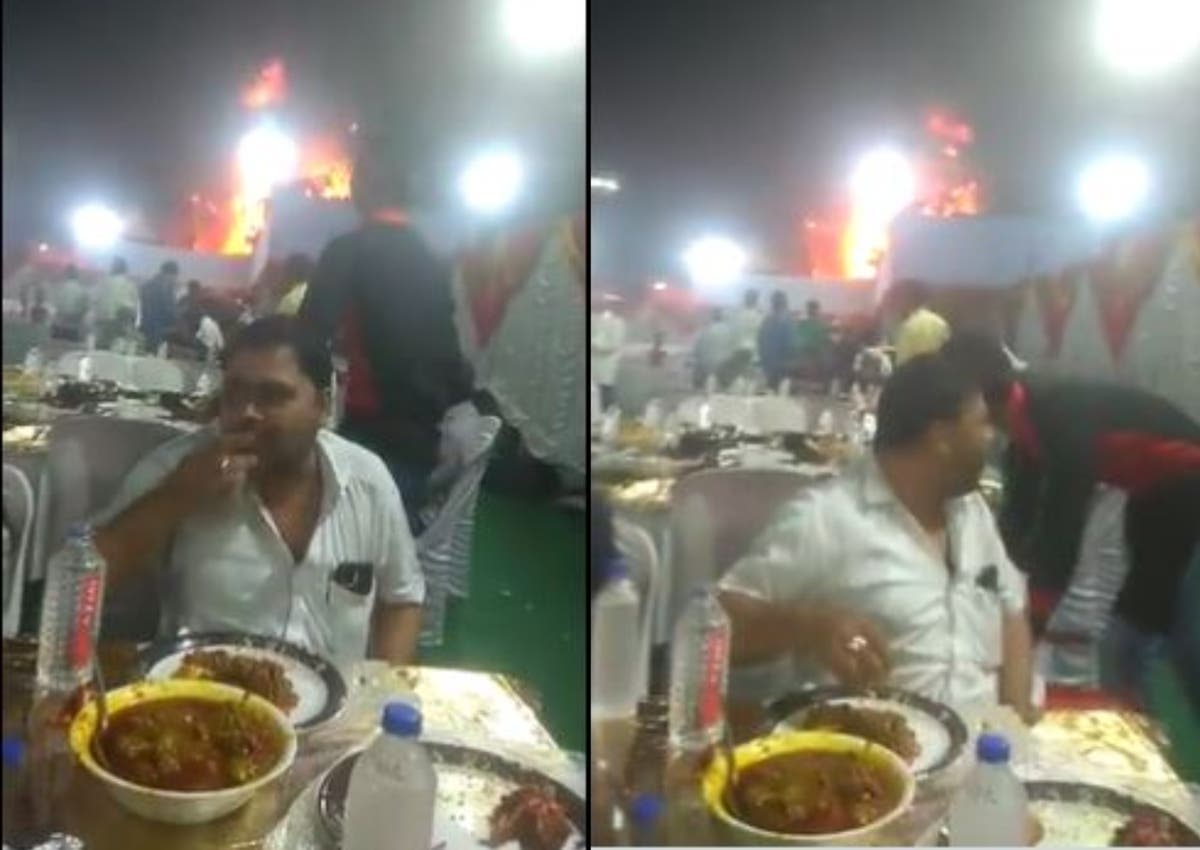 Video of wedding guest continuing to eat as marquee burns down around ...