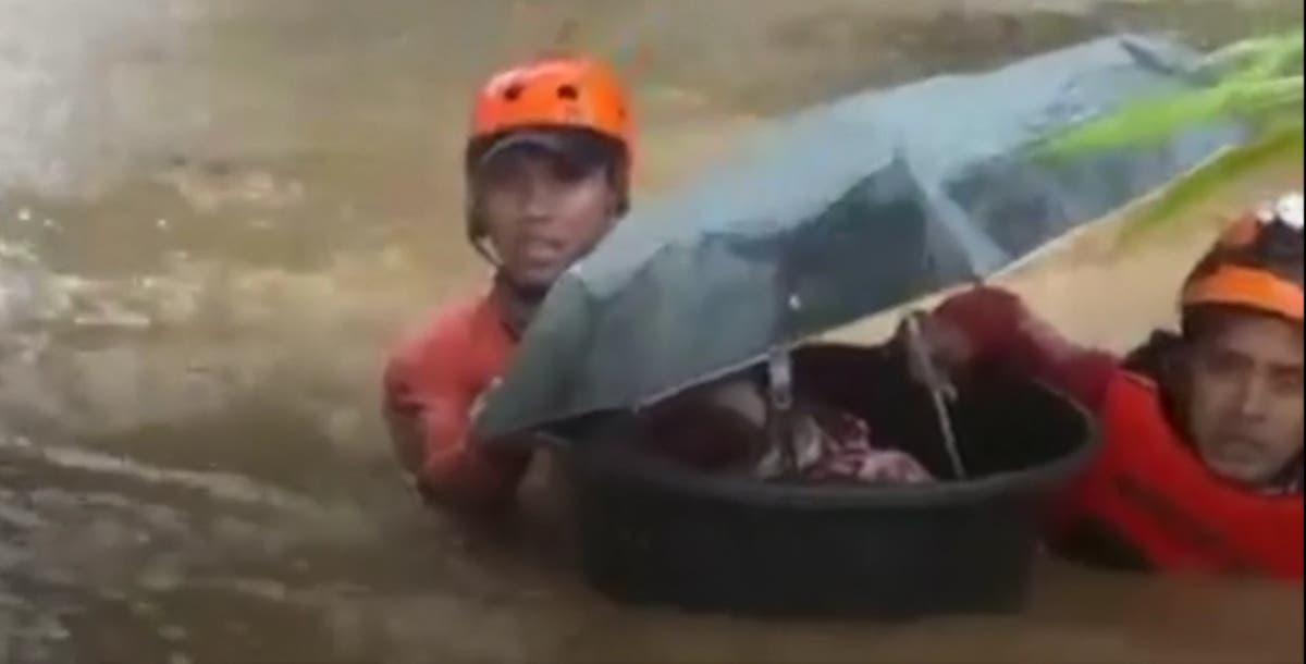Philippines typhoon Rai: Month-old baby rescued to safety in a tub ...