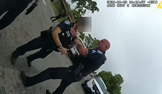 Police sergeant who grabbed fellow officer by the throat charged with ...