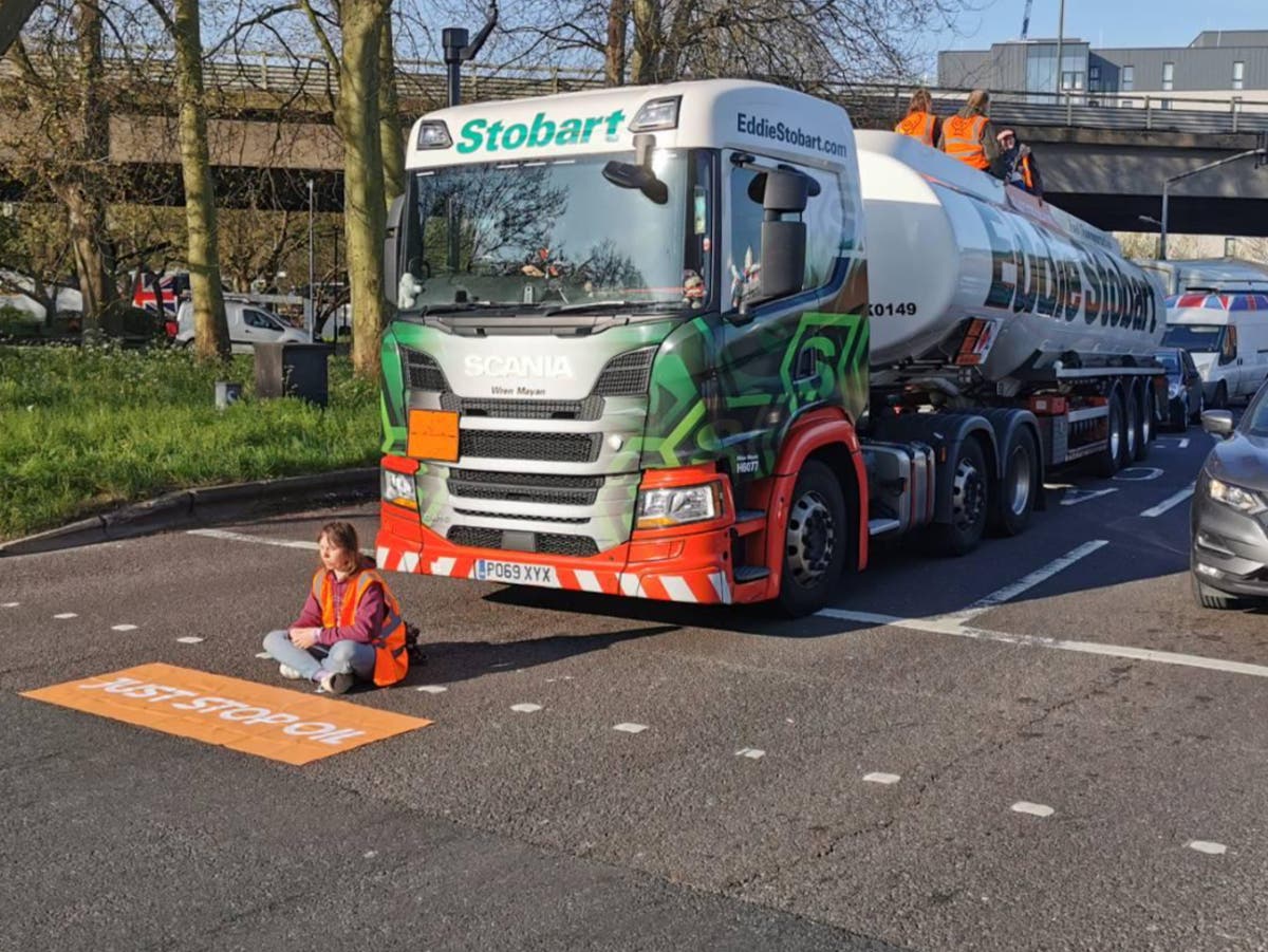 Just Stop Oil climate protesters halt fuel tanker near M4 | The Independent