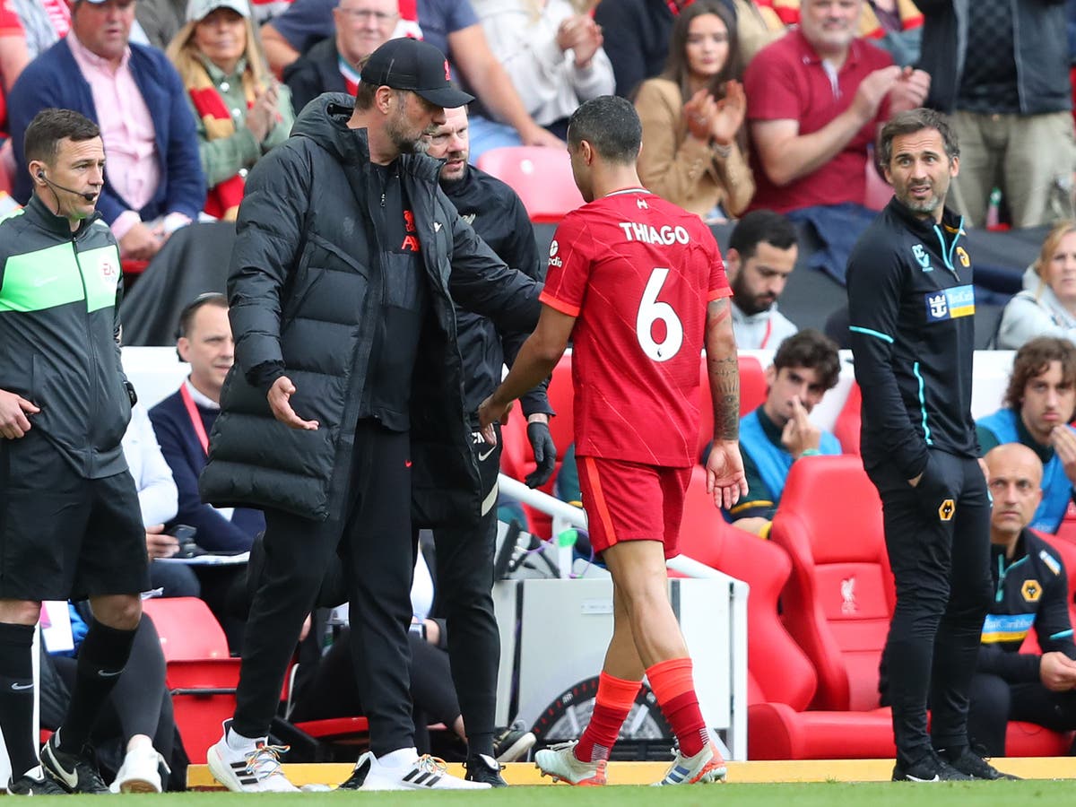 Thiago injury: Liverpool midfielder forced off against Wolves to spark ...