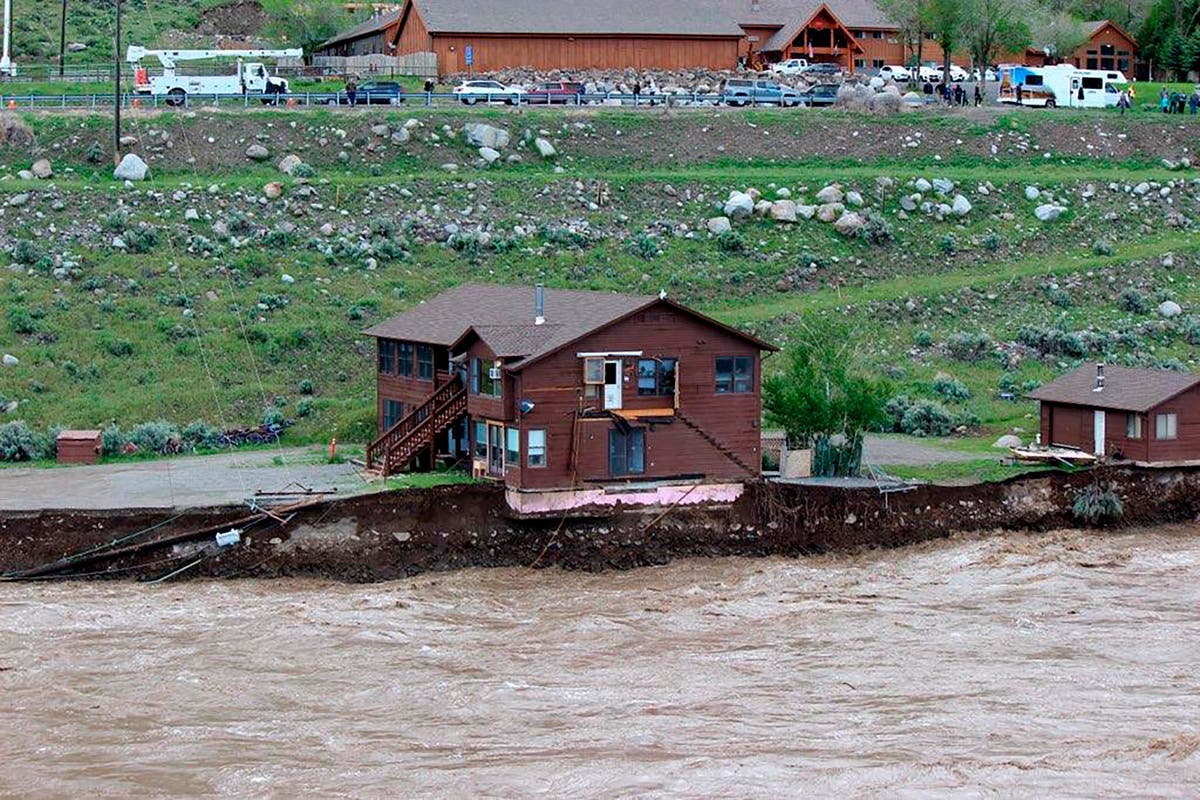 Yellowstone officials assess damage after historic floods | The Independent