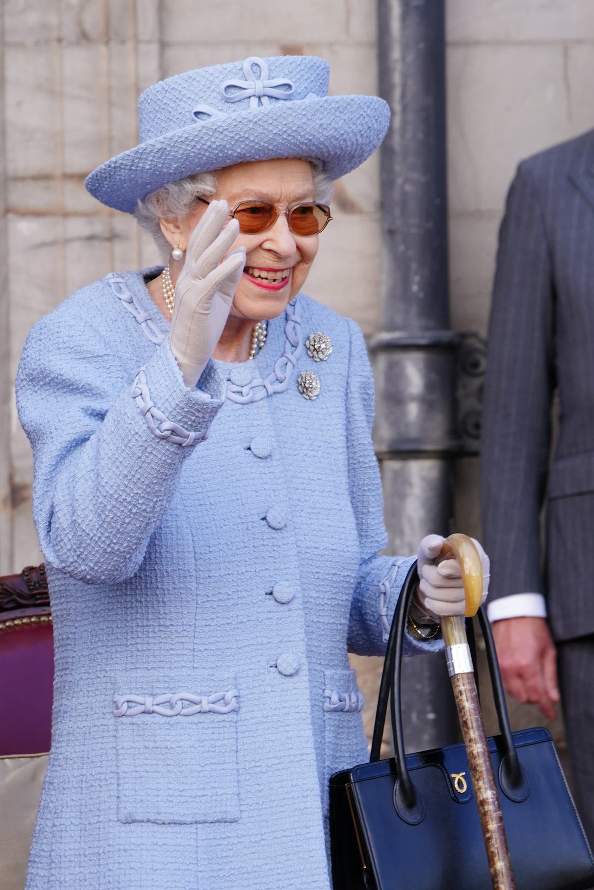Smiling Queen takes part in third event during royal week in Scotland ...