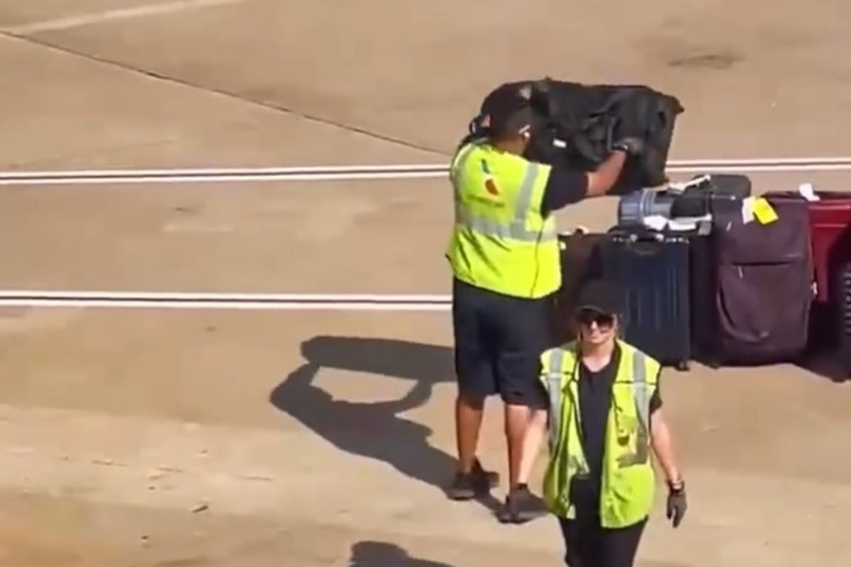 Viral video shows baggage handlers throwing luggage around | The ...