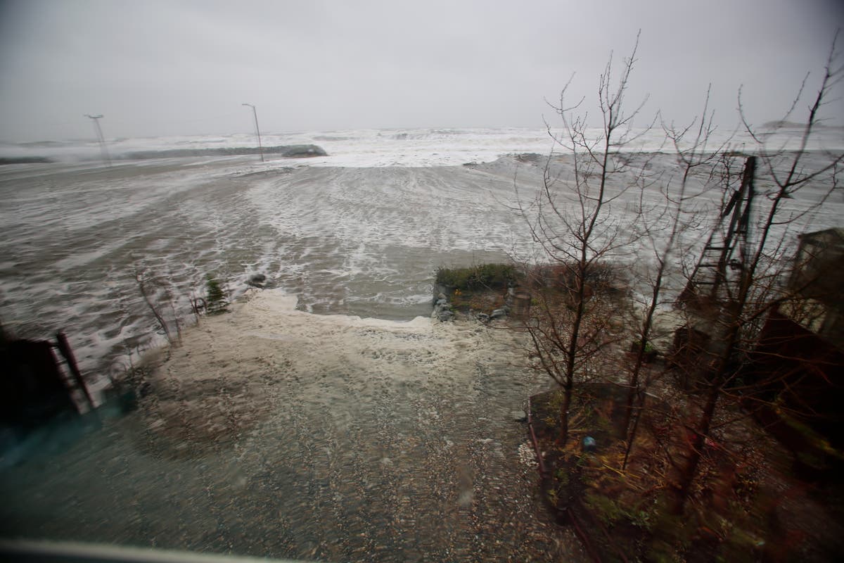 Flood waters receding after storm batters western Alaska | The Independent