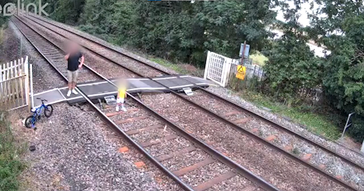 Man leaves toddler to wander on train tracks while he talks on phone ...