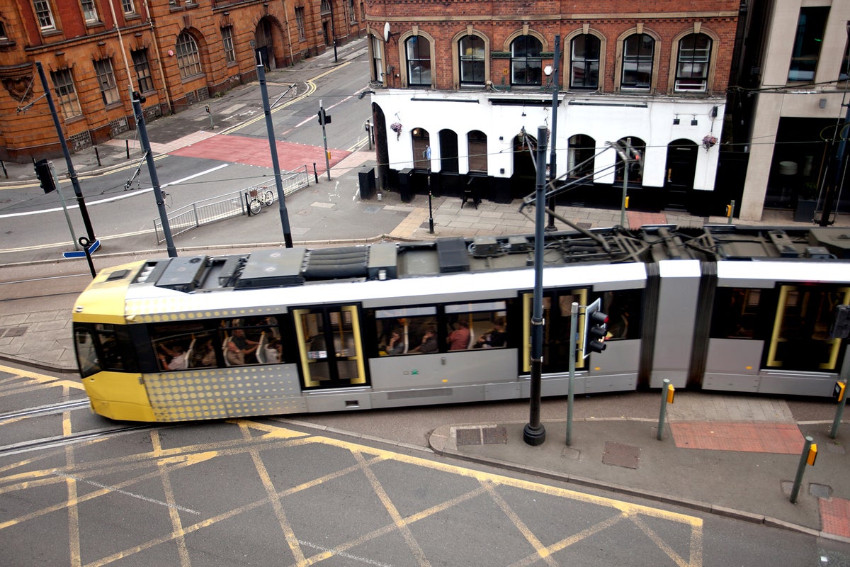 Four injured as tram and car collide in Manchester | The Independent