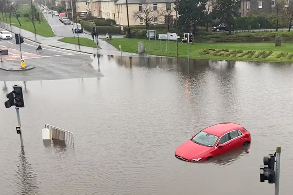 ‘Danger to life’ floods overwhelm homes and roads in Scotland after ...