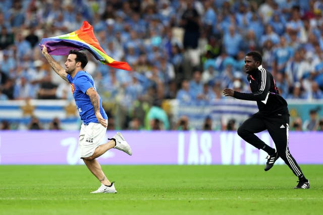 World Cup: Pitch invader brings rainbow flag onto field during Portugal ...