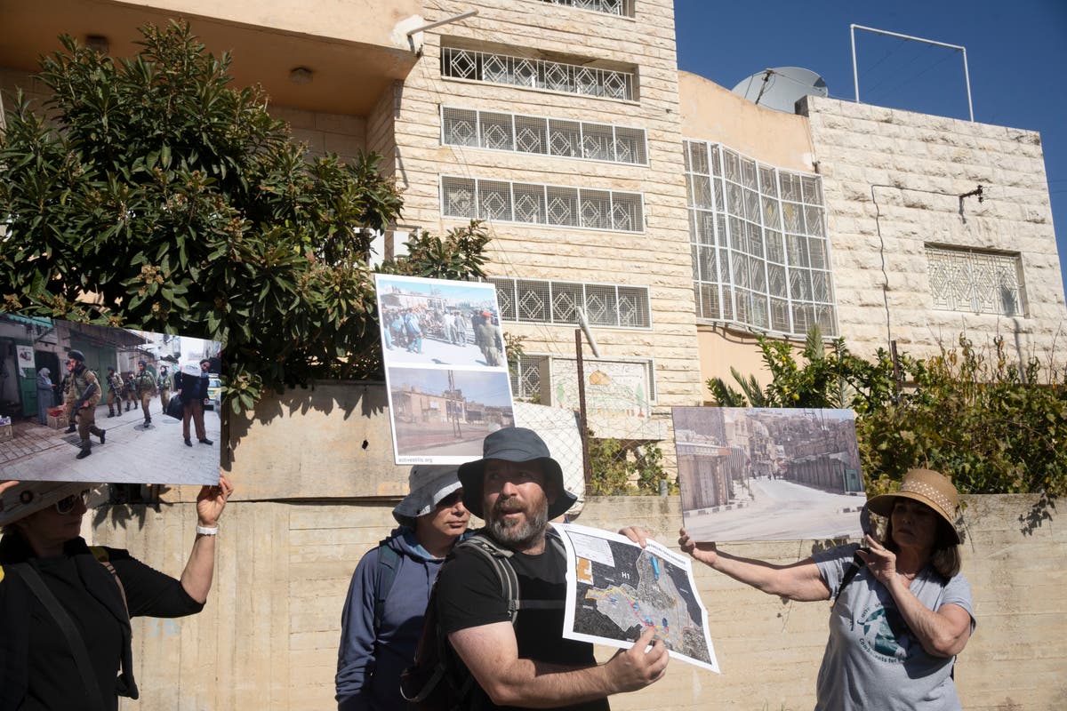Israeli peace activists show presence in West Bank hot spot | The ...