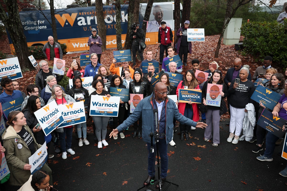 Raphael Warnock beats Herschel Walker in Georgia to give Democrats 51 ...