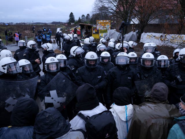 Police clash with climate activists as they clear German coal mine ...