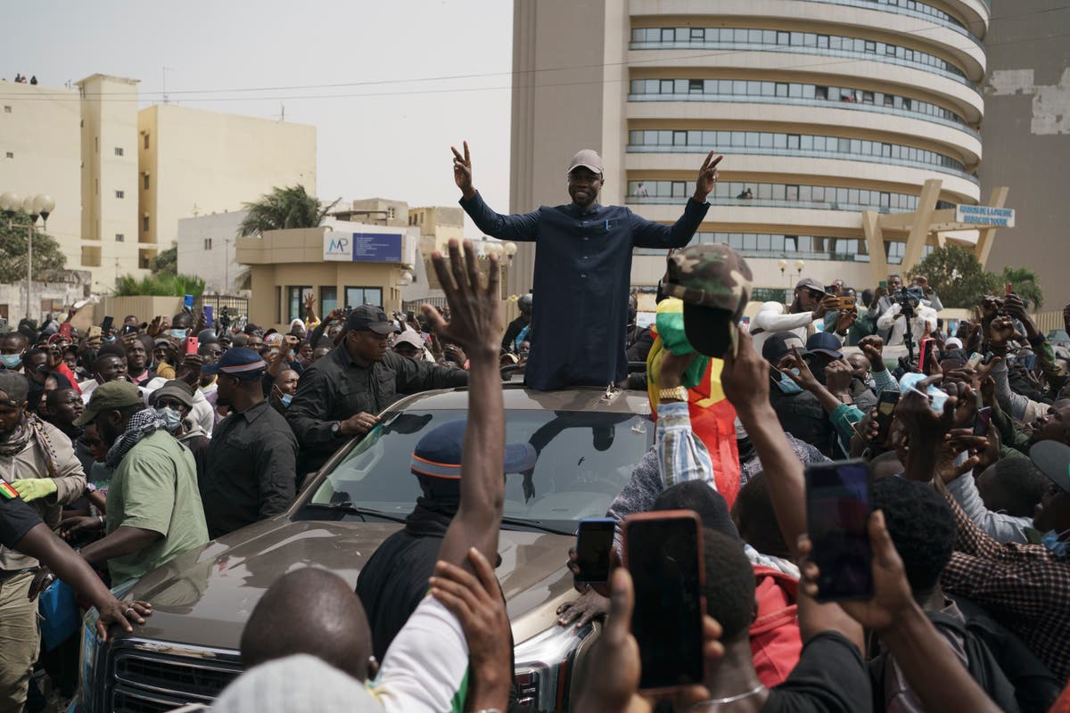 Senegal police smash car, forcibly remove opposition leader | The ...