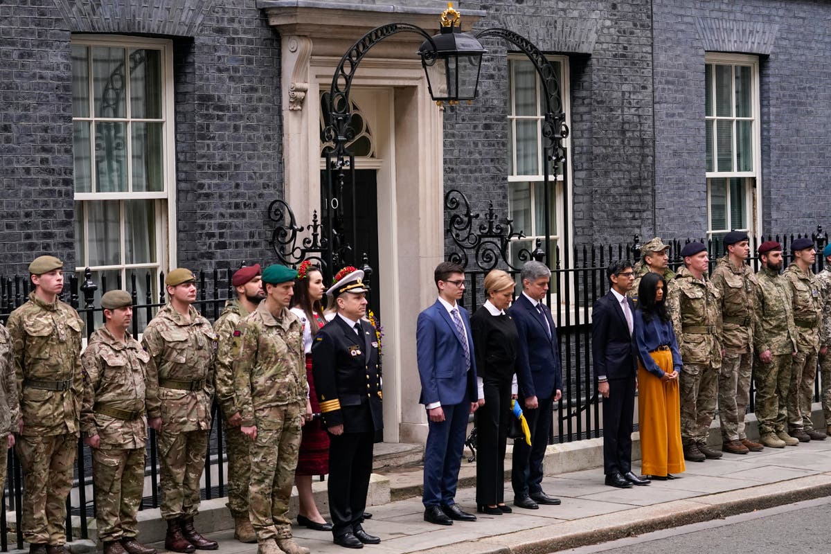 UK falls silent on anniversary of Russian invasion as Sunak praises ...