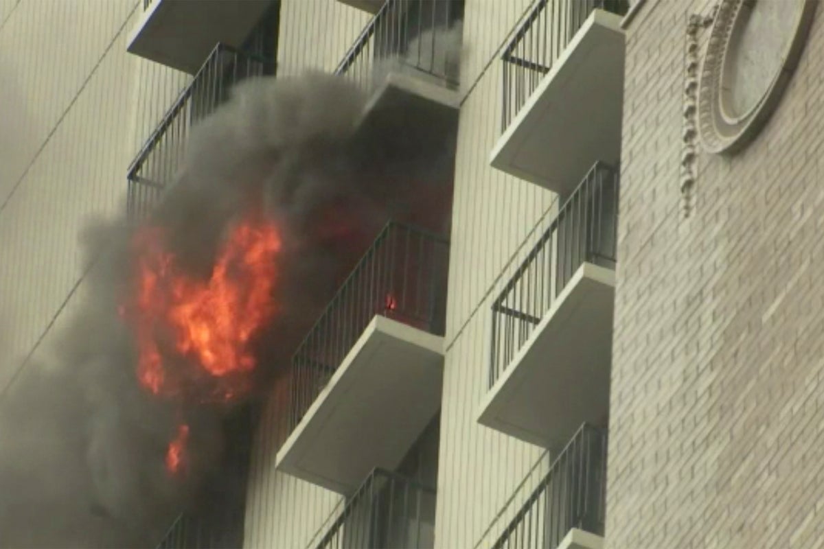 Chicago firefighter critically injured in high-rise blaze | The Independent