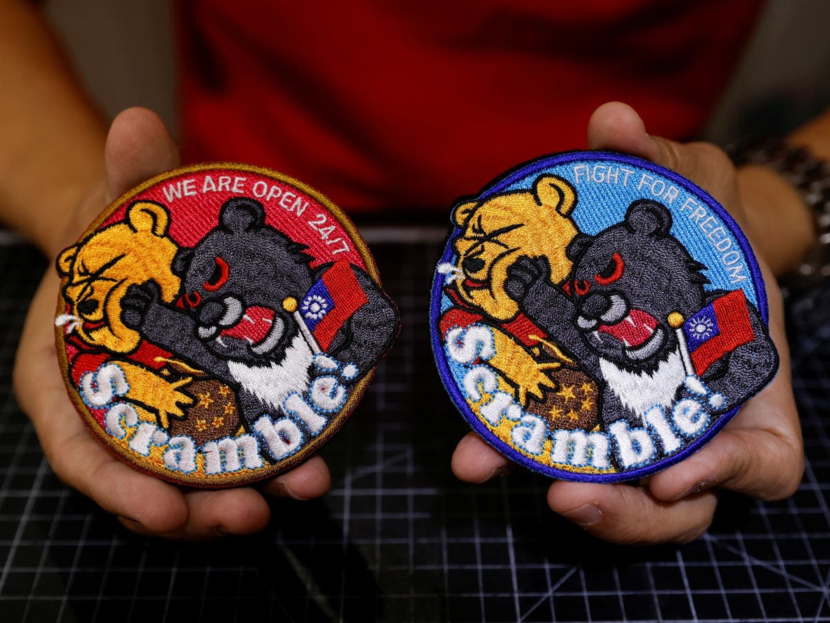 Taiwan residents rush to buy air force badges showing bear punching ...