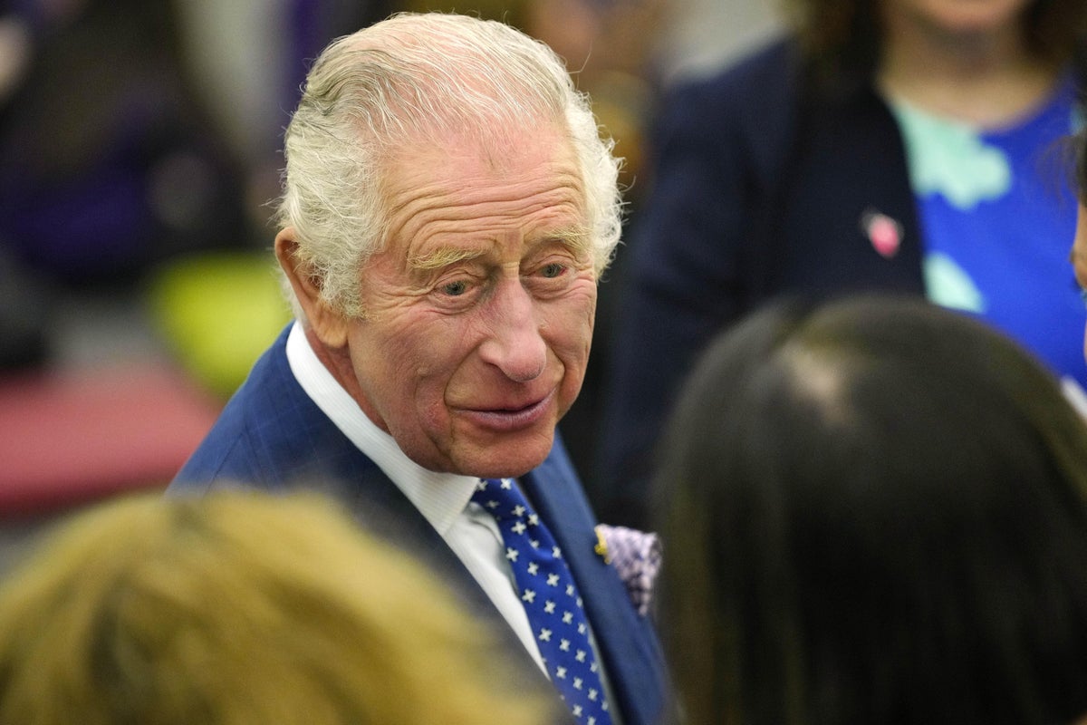 Nearly half of Britons think Charles performing well as King, poll ...