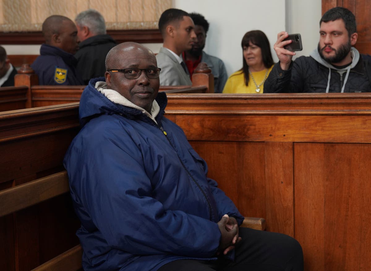 Rwandan genocide suspect appears in court holding Bible after 22 years ...