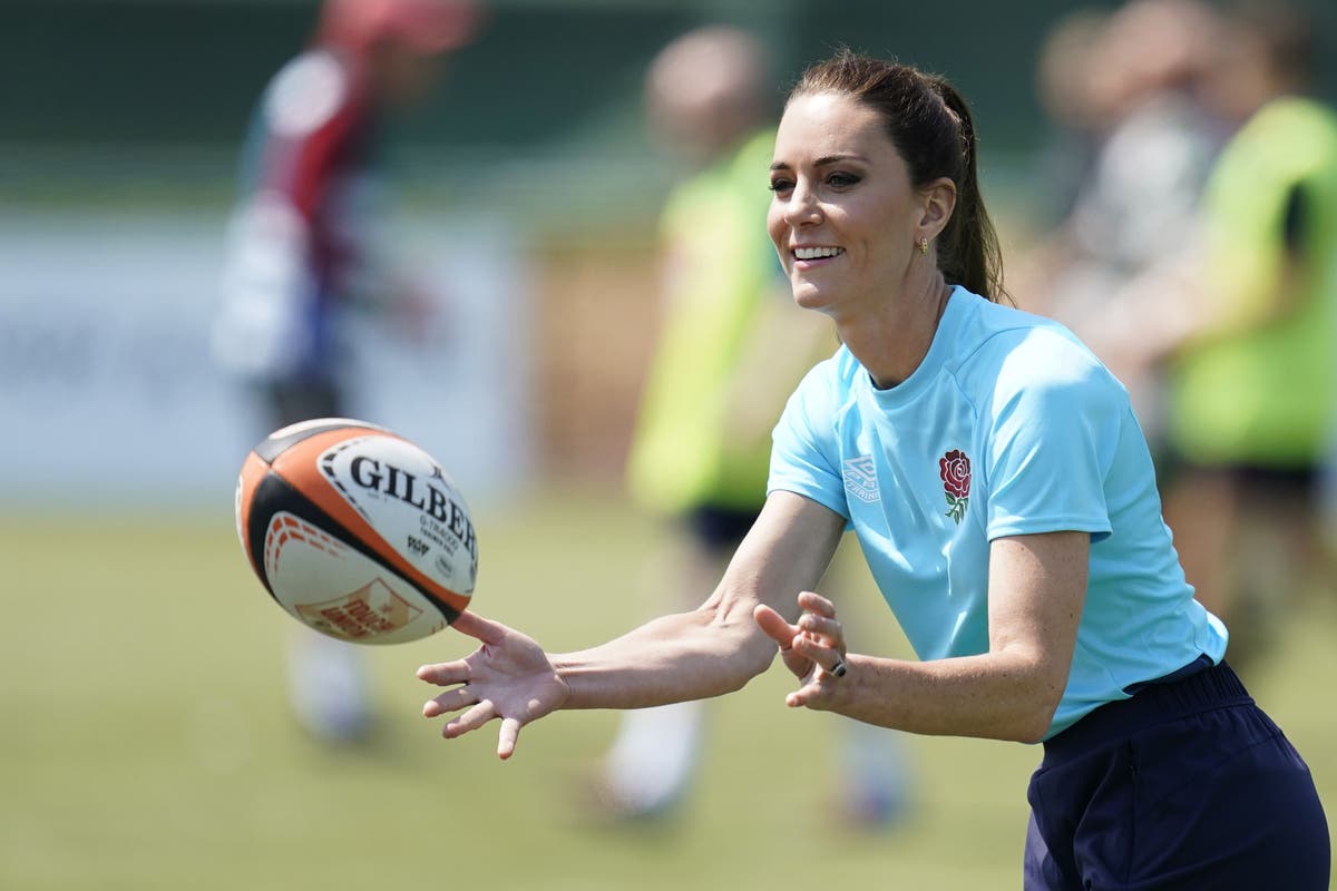 Kate shows off sporting skills in game of walking rugby | The Independent