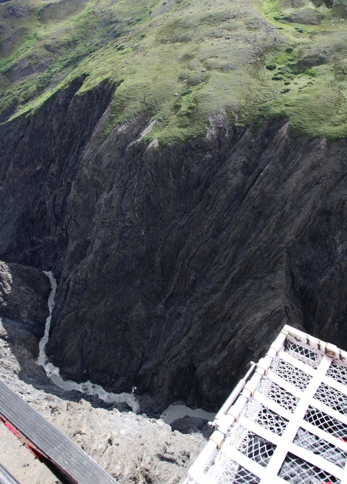 Conditions are too dangerous to recover bodies of 2 men killed in ...