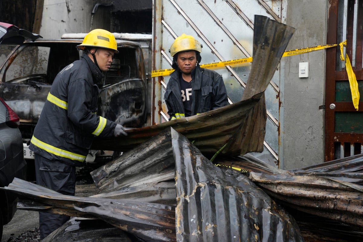 A fire kills 15 in a Philippine factory, where rains and a wrong ...