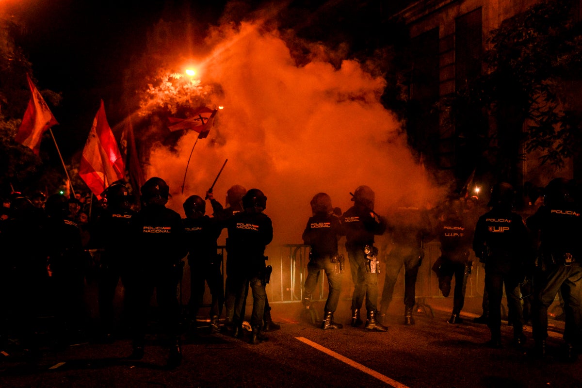 Protests turn ugly as pressure mounts on Spain's acting government for ...