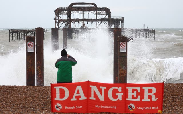 Danger-to-life weather warning as people seen taking photos of waves ...
