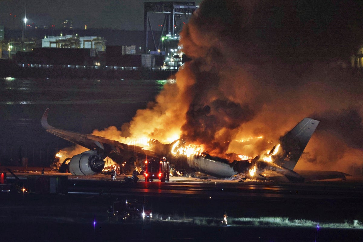 Watch: Japan Airlines plane engulfed in flames at Tokyo’s Haneda ...
