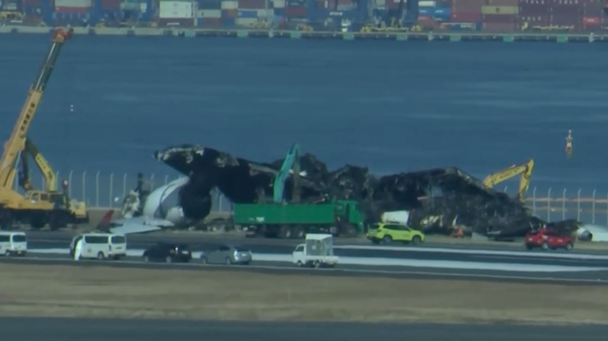 Watch: Japan aircraft wreckage to be removed following airport ...