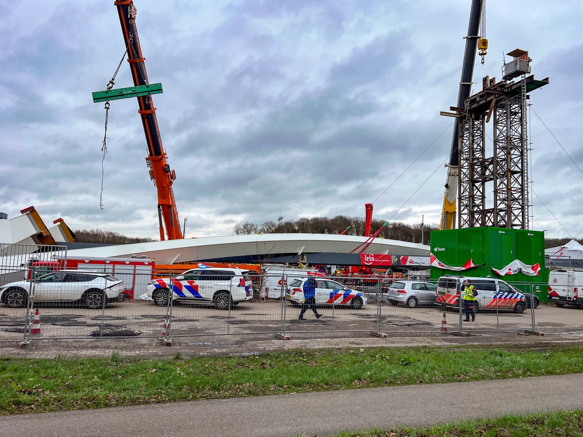 2 workers die after part of a bridge being built over a Dutch canal ...