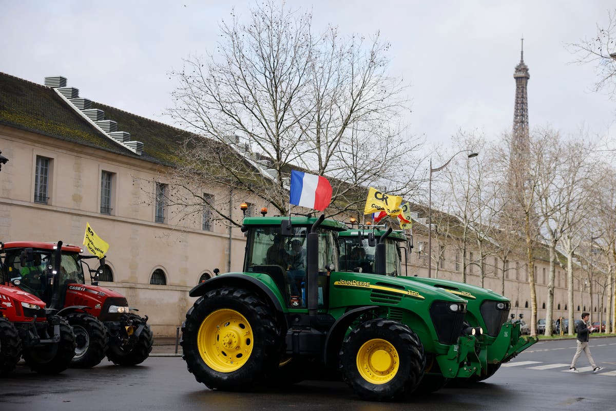 Angry French farmers with tractors are back on the streets of Paris for ...