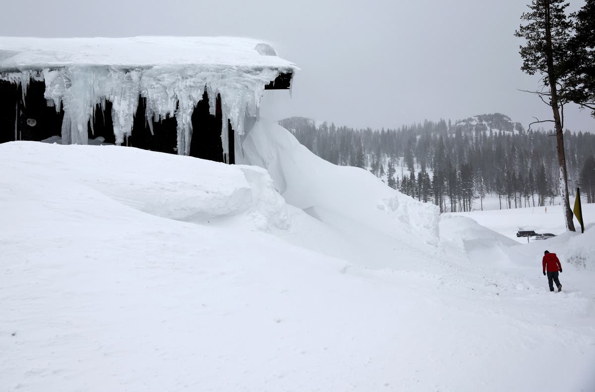 California blizzard leaves residents tunneling out with more snow on ...