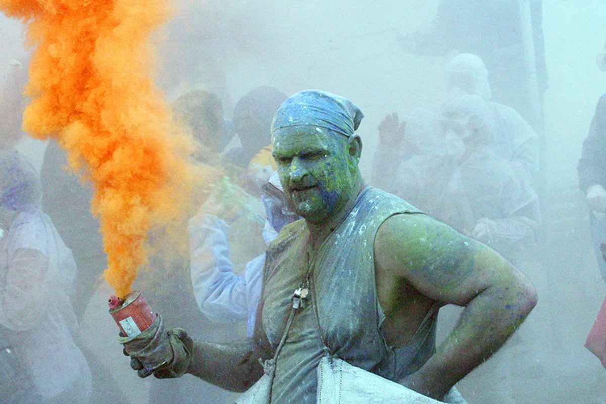Watch: Greek revellers throw coloured flour at each other in 200-year ...