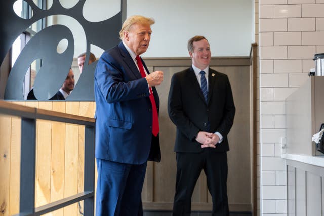 Trump indulges a hobby – handing out fast food – as he hits Chick-fil-A ...