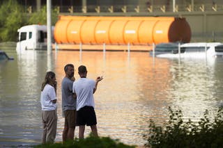 Dubai flooding: reeling from flooding after storm brings heavy rain ...