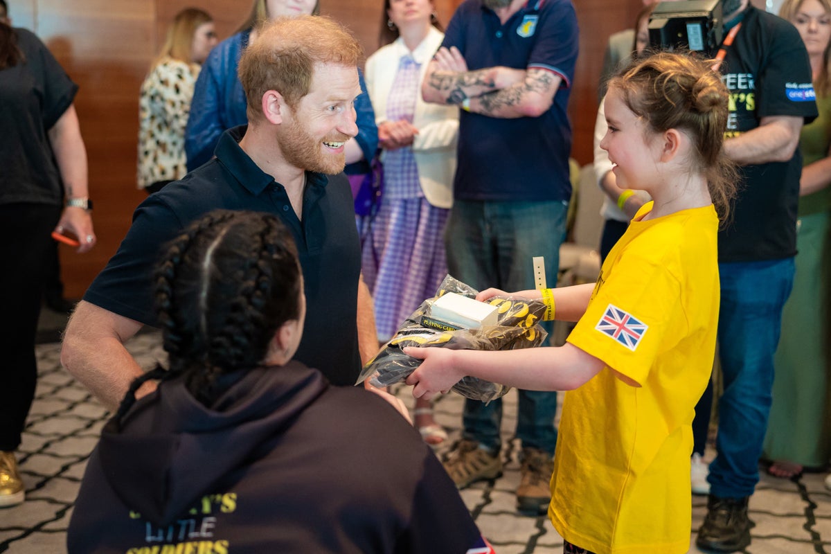 Harry pays surprise visit to charity event for bereaved military ...