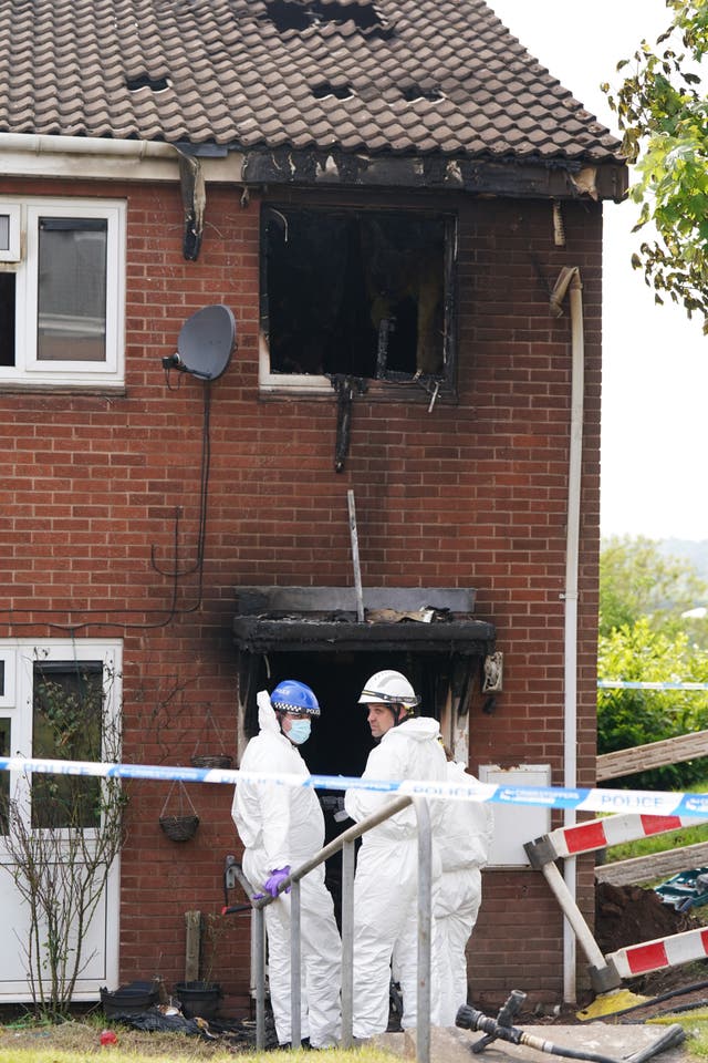 Two women killed in house fire as police arrest two men on suspicion of ...